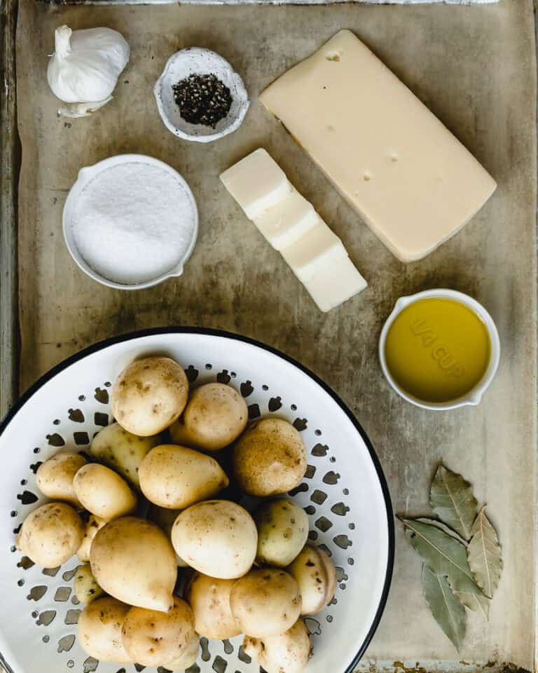 Smashed Raclette Potatoes - with garlic bay leaf butter